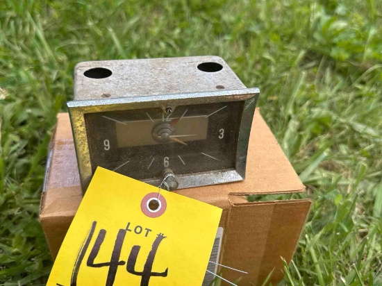 57 Chevy clock | Online Auctions | Proxibid